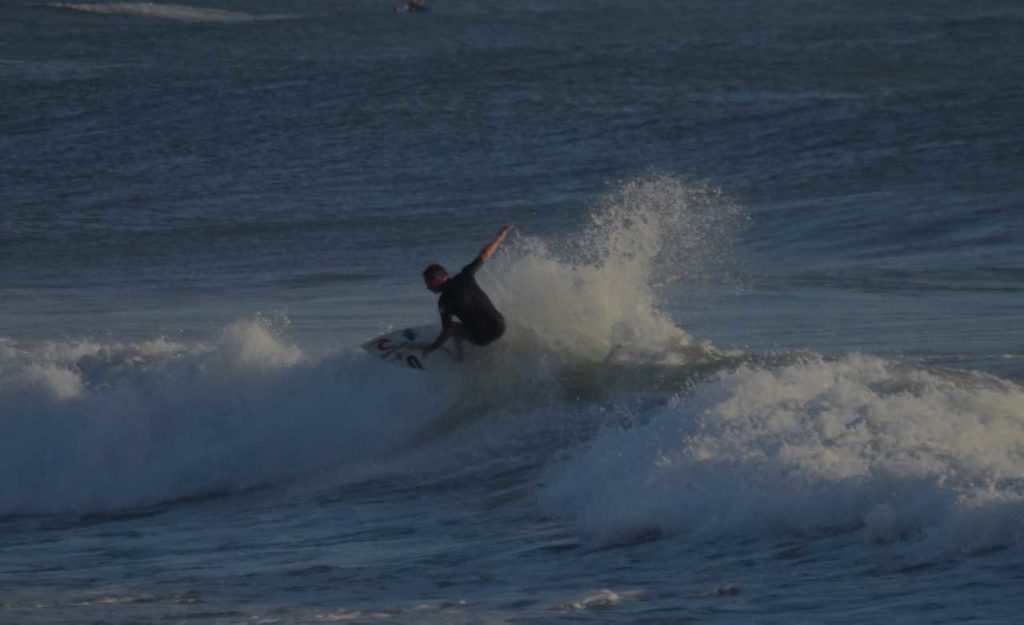 Robbie-Surfing-Dark - Robbie Sherwell's XL Surfing Academy